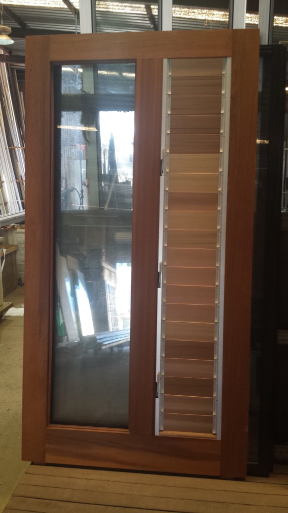 Pivot door with timber louvres – THE WINDOW MAN