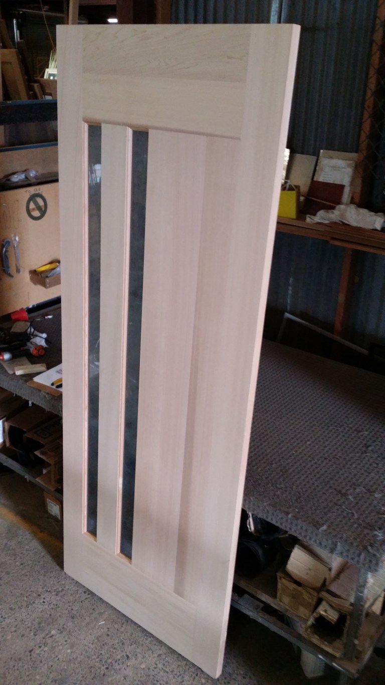 Cedar Door with thin vertical rice paper laminate strips – THE WINDOW MAN